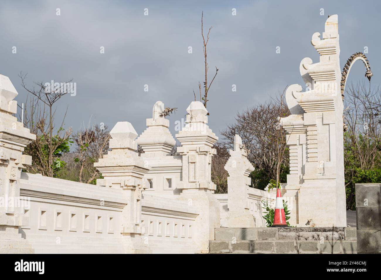 A stone staircase leading to an ornate entrance with intricate carvings ...