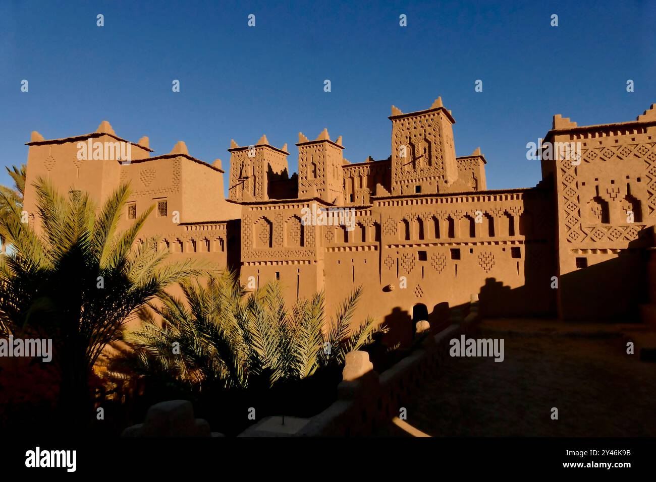 the remains of the ancient Kasbahs in the sunset light, in the Skoura ...