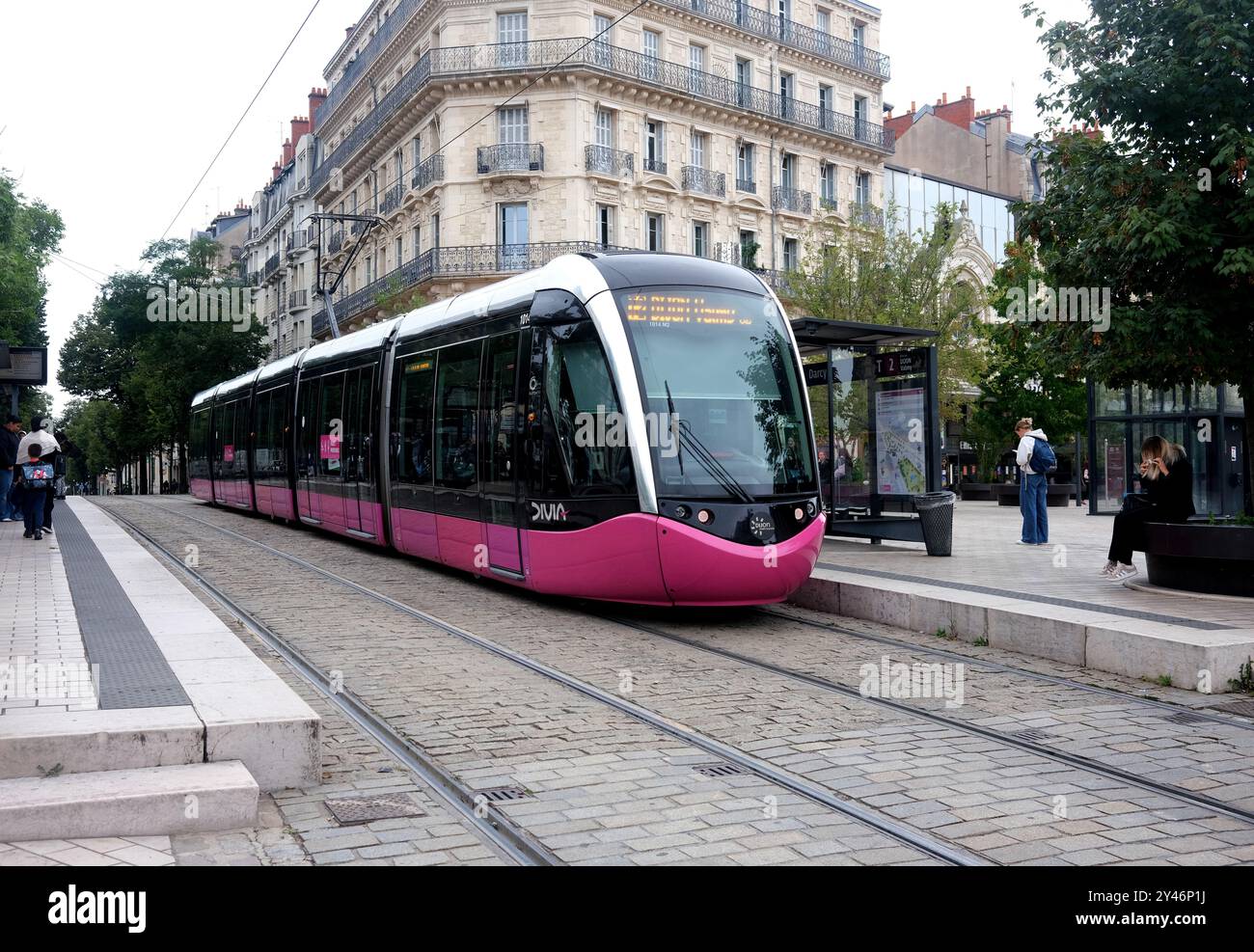 Pink tram the streets of Dijon in France Stock Photo - Alamy