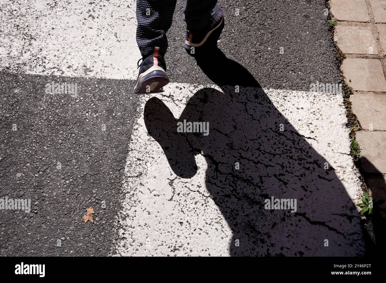 Shadow and light of mans footsteps Stock Photo - Alamy