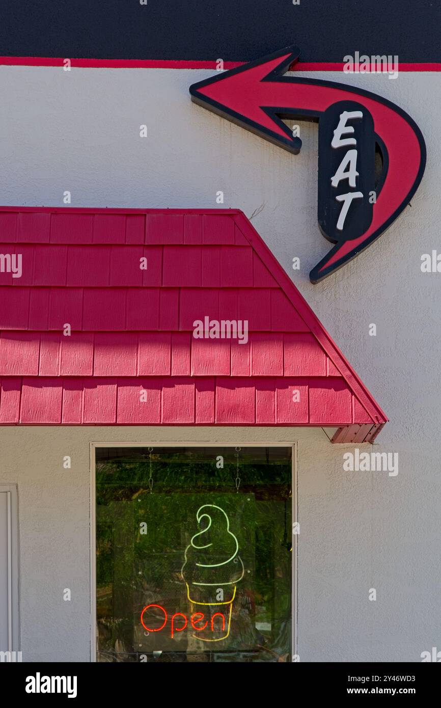 Ice cream shop wall with word ‘Eat’ on arrow sign in downtown Moab Utah ...
