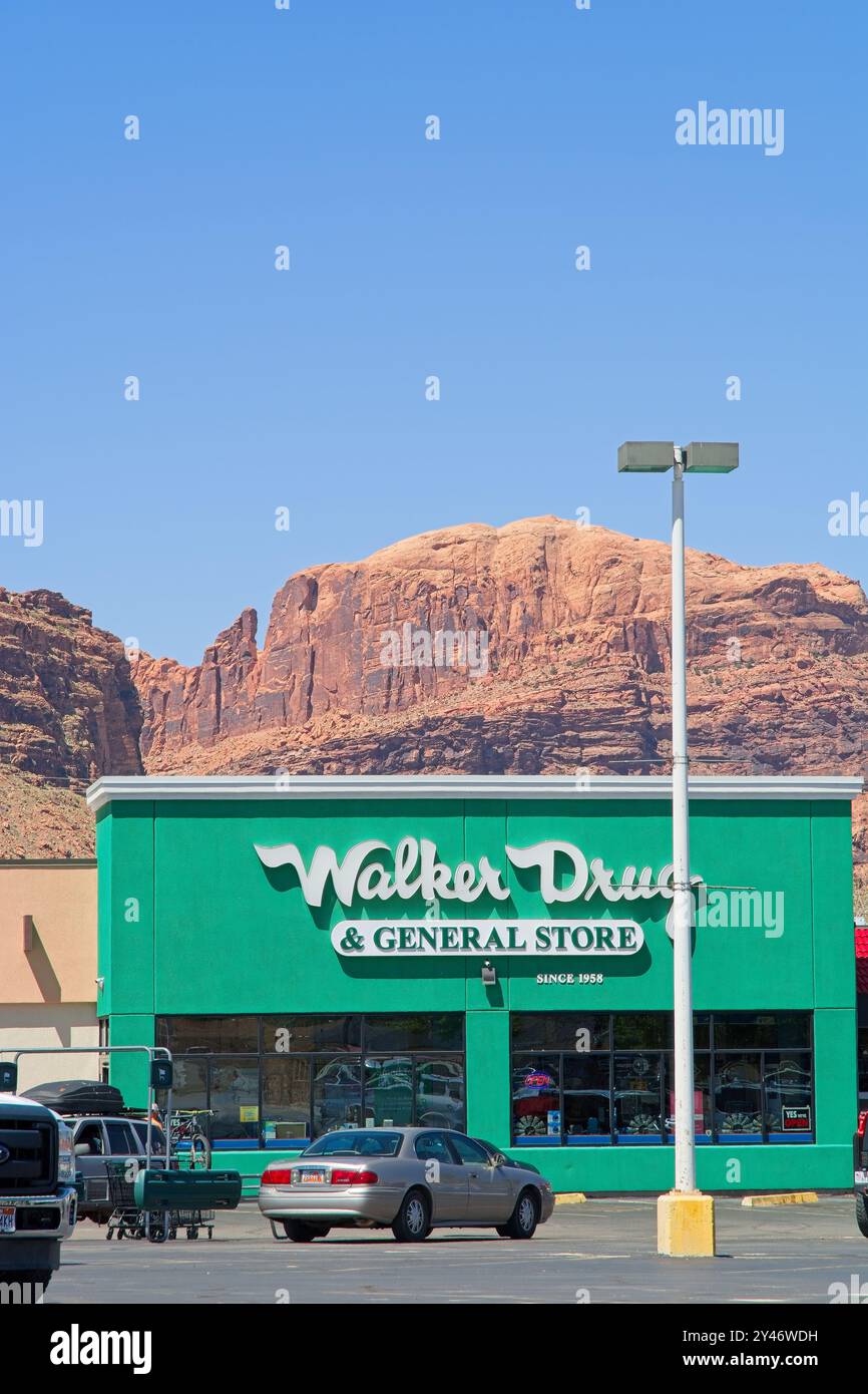 General store under Moab rim cliffs in downtown Moab Utah — April 2024 ...