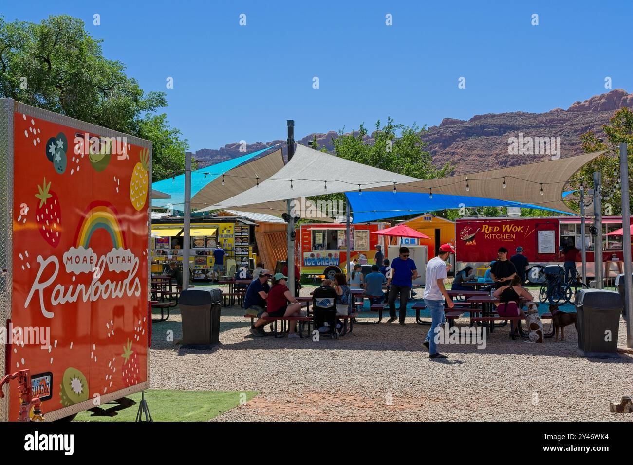 Patrons under canvas canopies at Moab Food Truck Park — Moab Utah ...