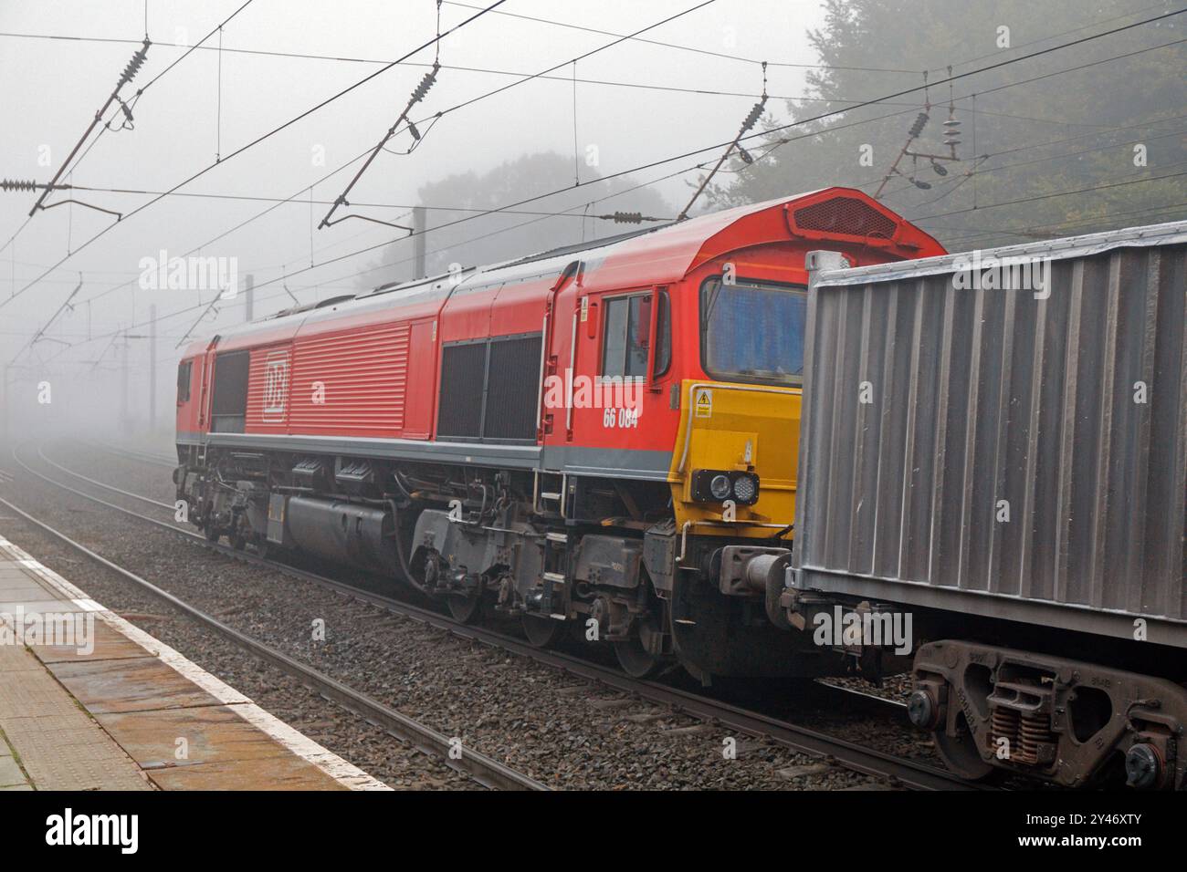 66084 on the down freight line at a fogbound Lancaster railway station ...