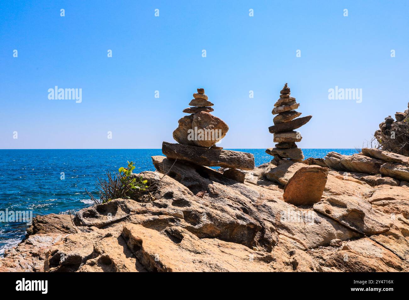 The Man Made Stack (Cairn) on the Seaside of Thailand Stock Photo - Alamy