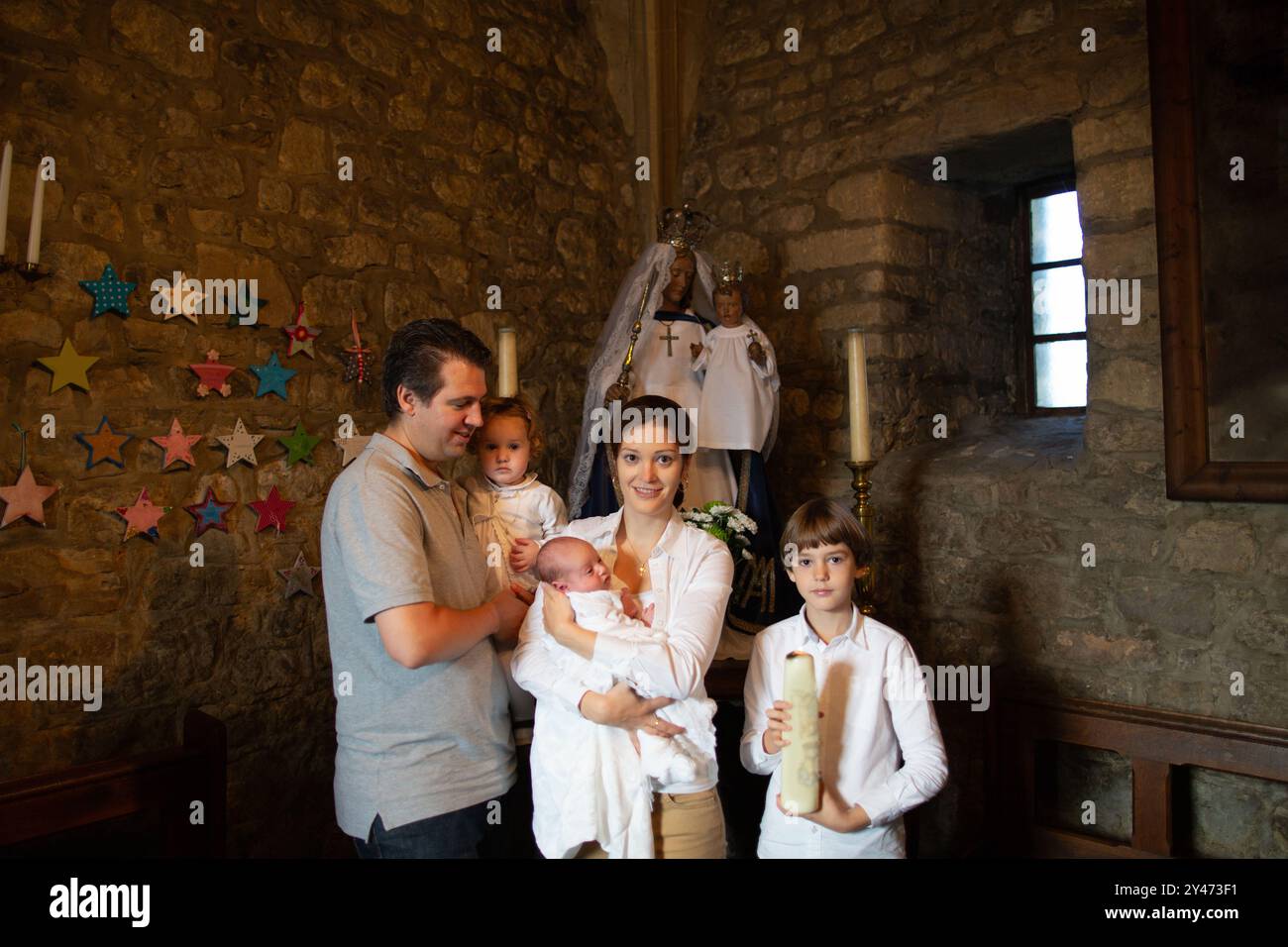Baptism of newborn baby in Catholic church. Christian tradition and ...