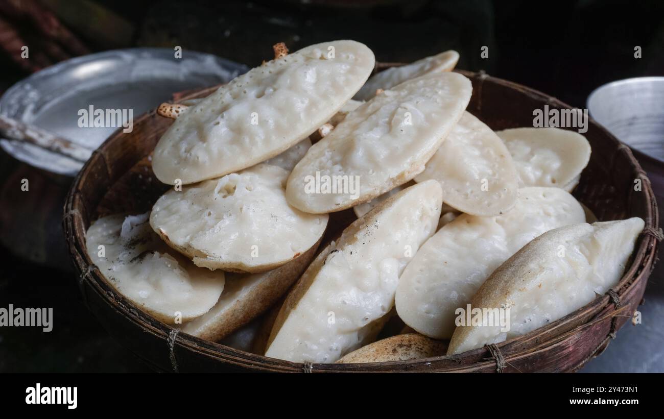 Bangladeshi pitha. Homemade winter pita chitoi pitha. Pitha is prepared ...