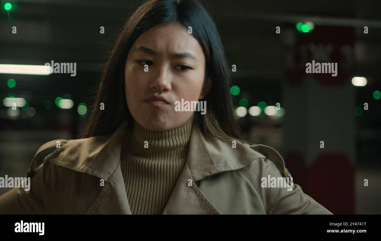 Doubtful unsure thoughtful young Asian woman girl korean chinese ...