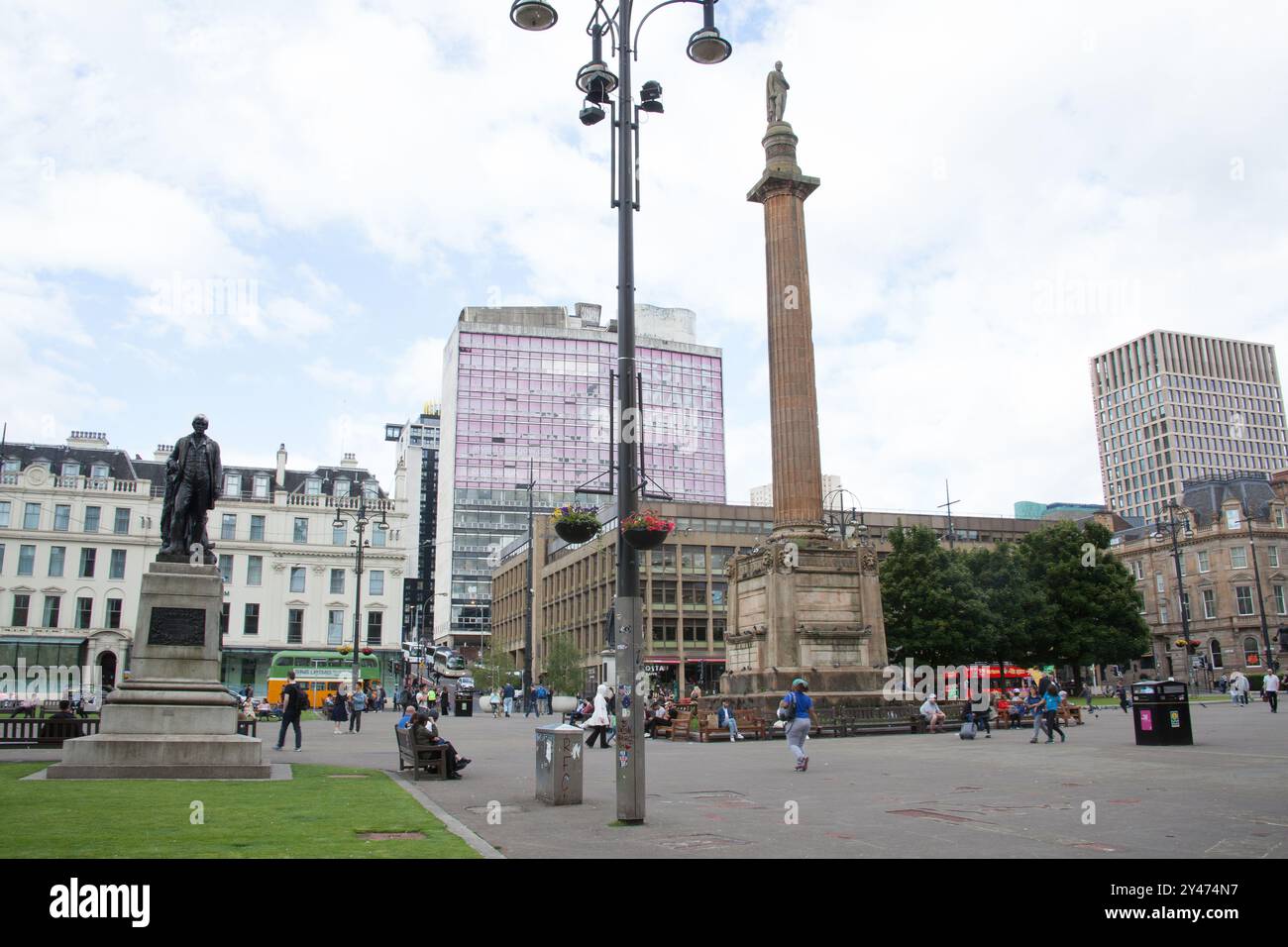 Views of George Square and the Robert Burns and Walter Scott statues in ...