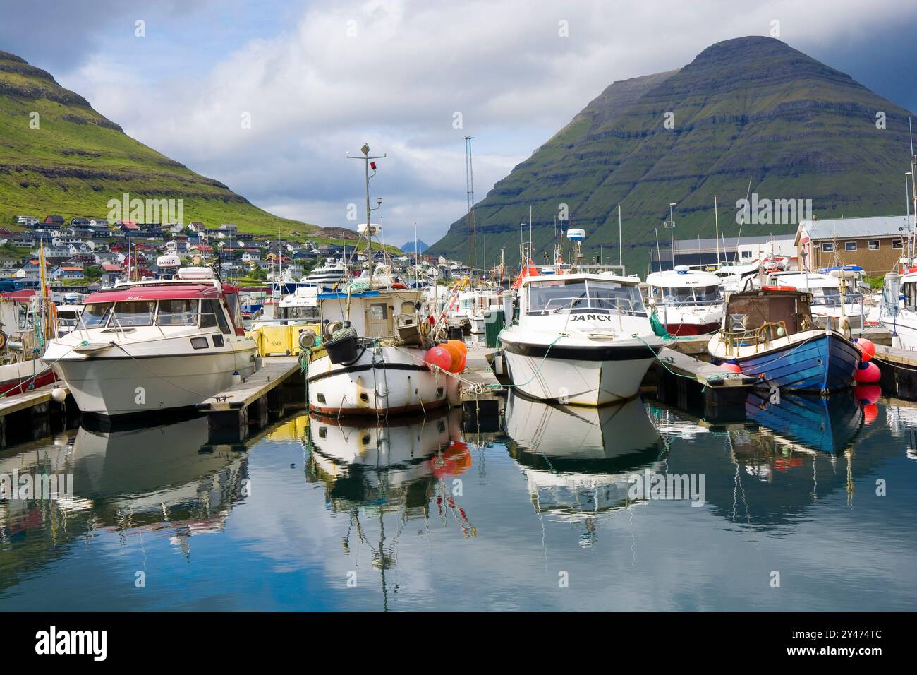 Boats moored in the harbor in Klaksvik - the second largest city of ...