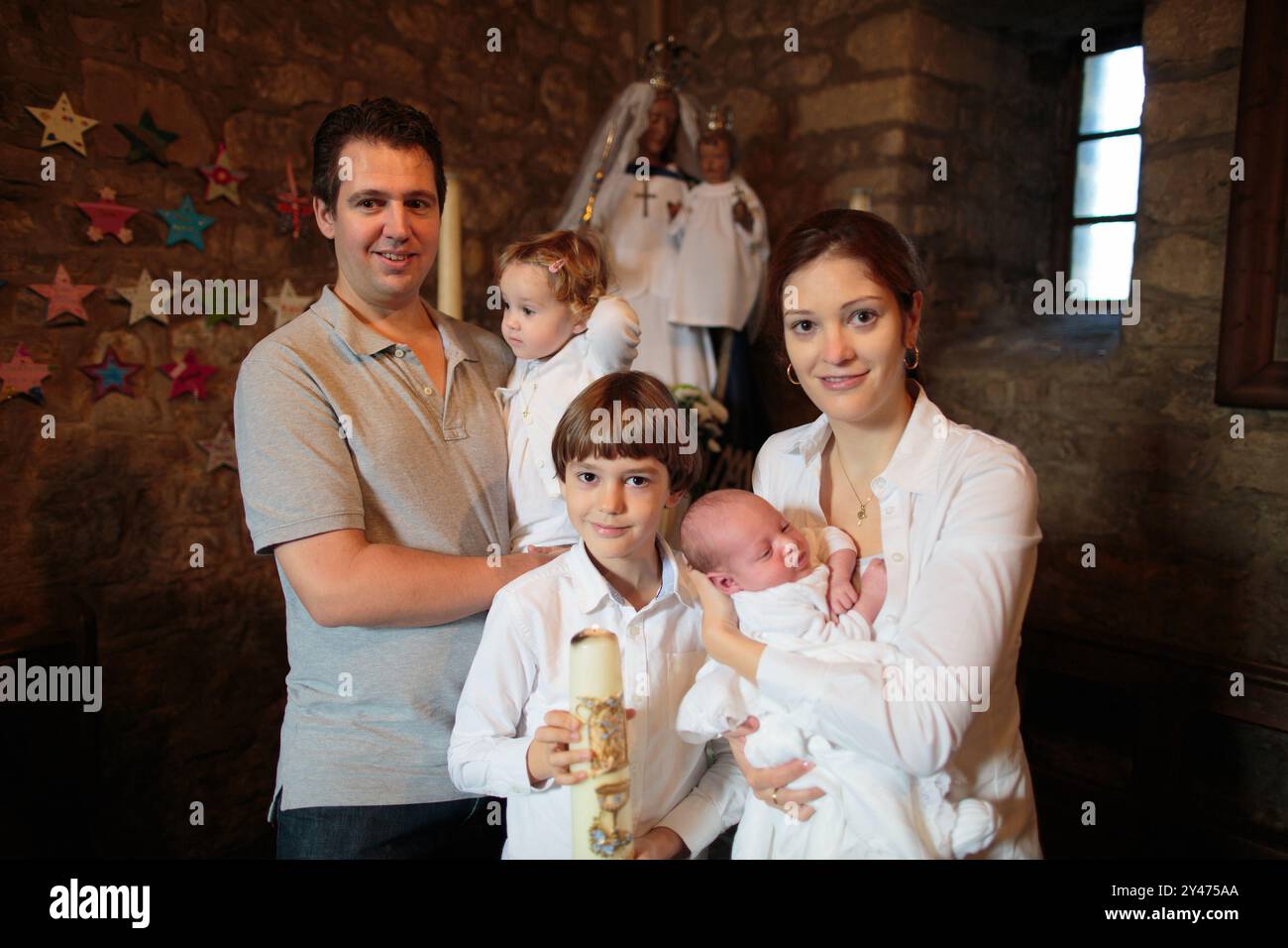 Baptism of newborn baby in Catholic church. Christian tradition and ...