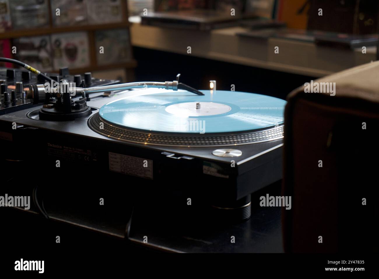 Vinyl Record Spinning on a Turntable in a Retro Record Store Stock ...