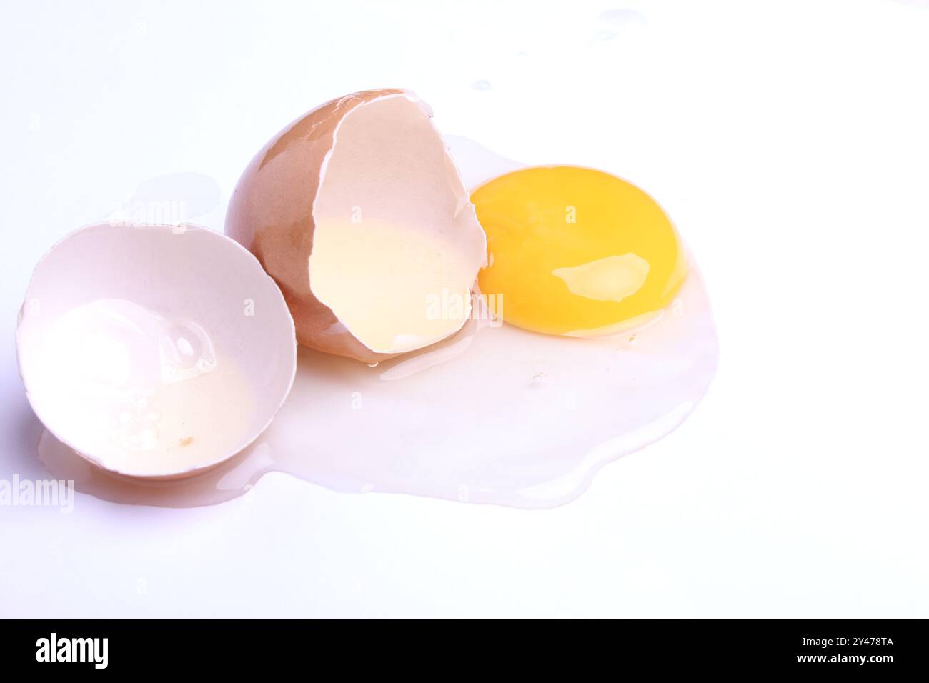 Egg with half open on white background. One egg cracked. with clipping ...