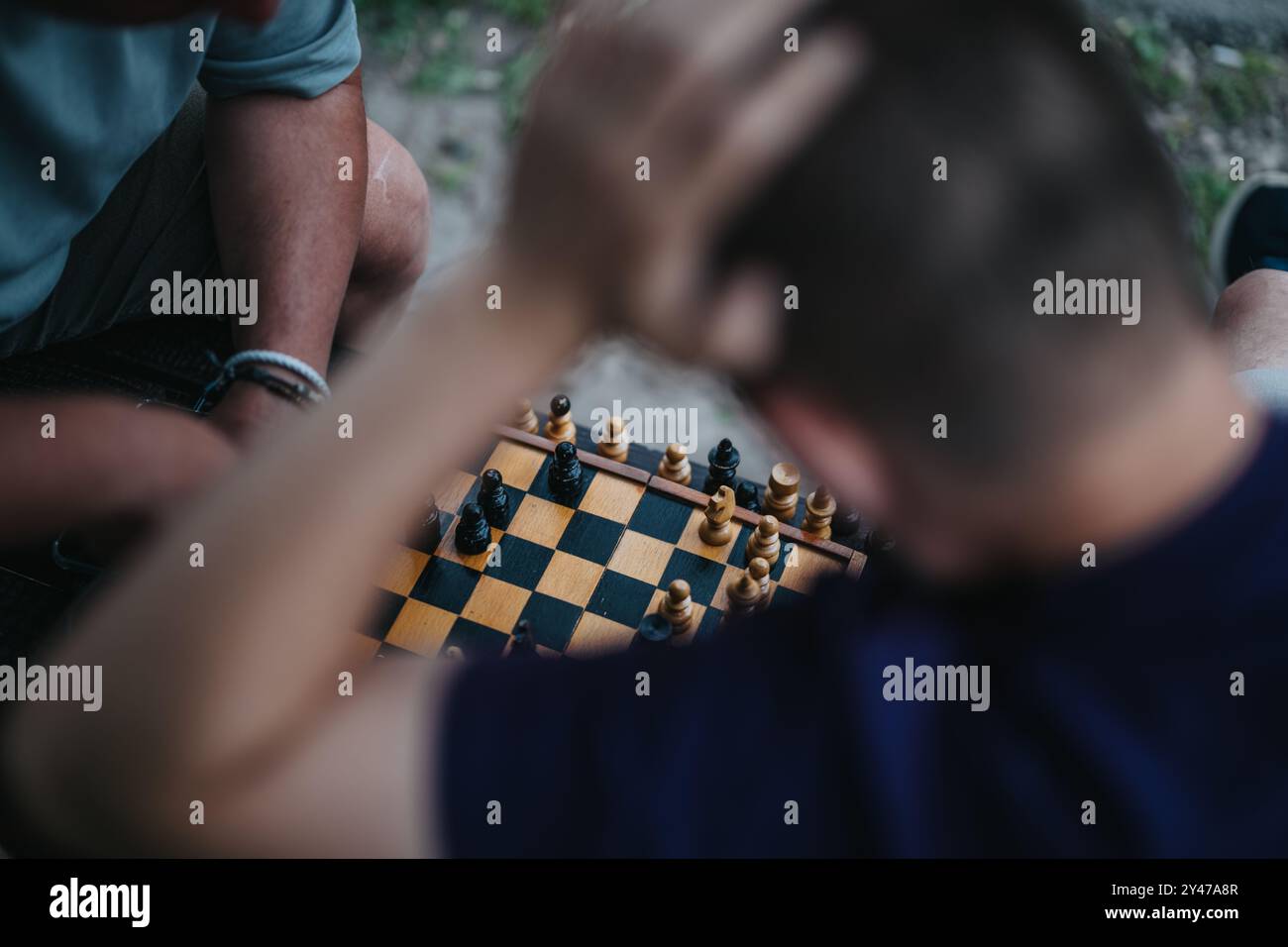 Play chess between two people hi-res stock photography and images - Alamy