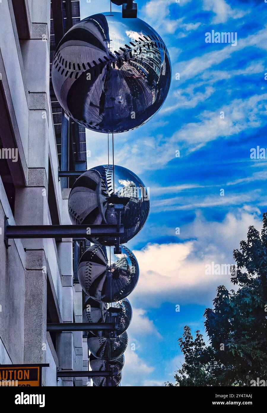 Decorative metal ball in the shape of baseballs outside Washington ...