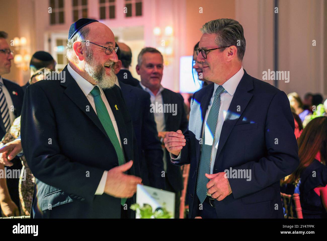 Prime Minister Keir Starmer speaks with Chief Rabbi Ephraim Mirvis, at ...