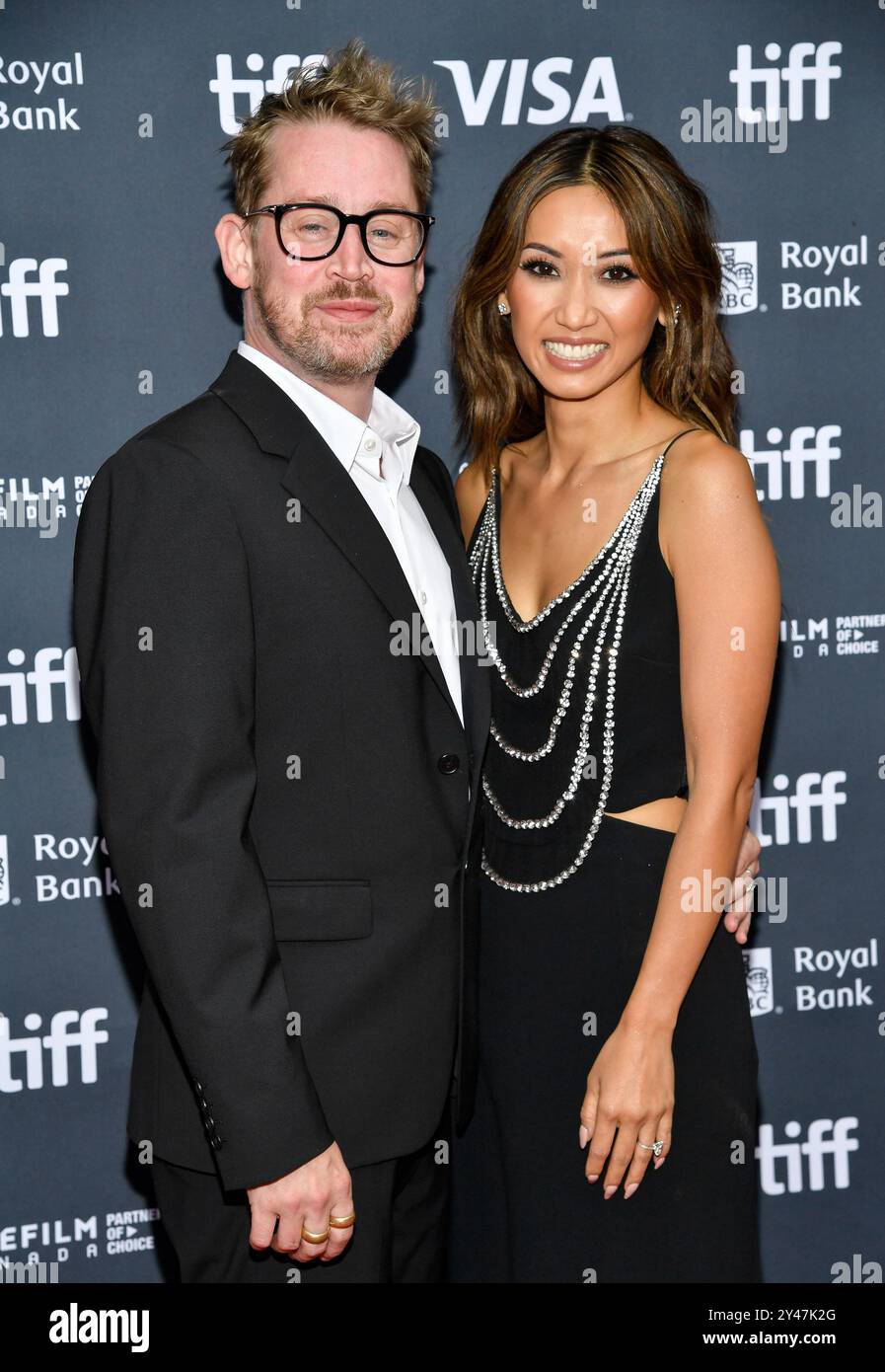 Macaulay Culkin, left, and Brenda Song attend the premiere of "The Last ...