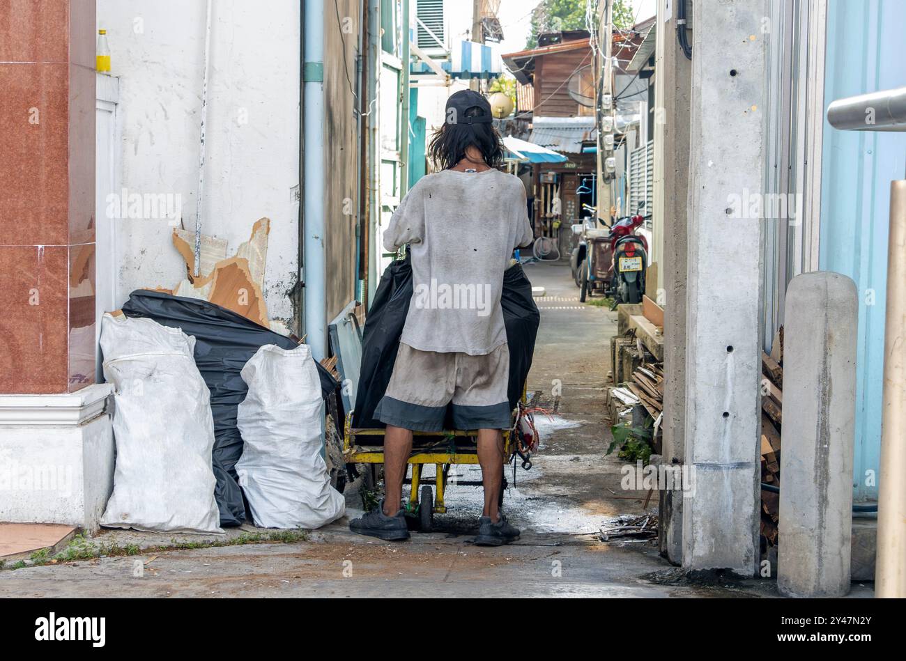 Poor homeless man trash hi-res stock photography and images - Alamy