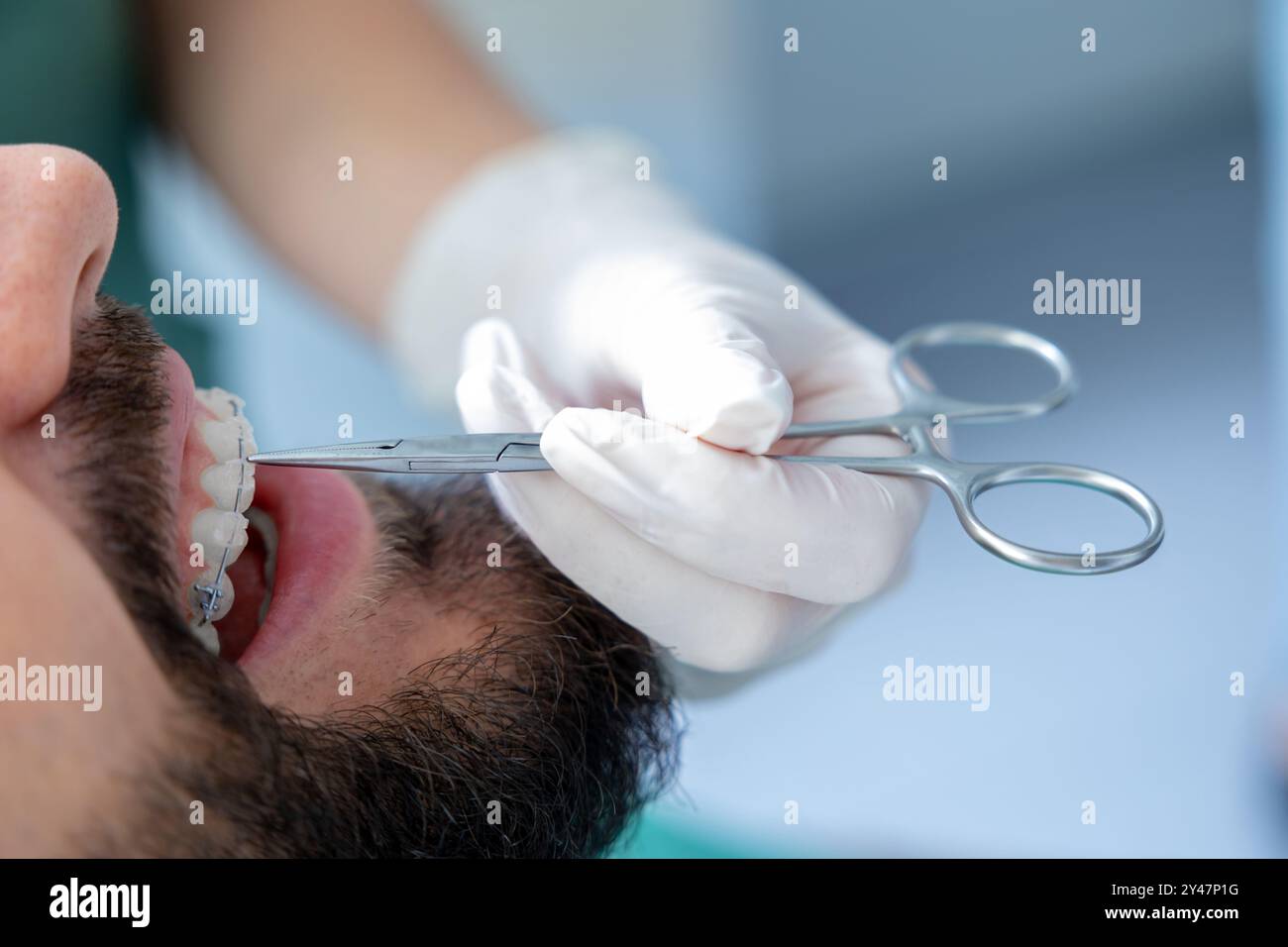 Professional mouth examination and dental treatment checkup in clinic ...