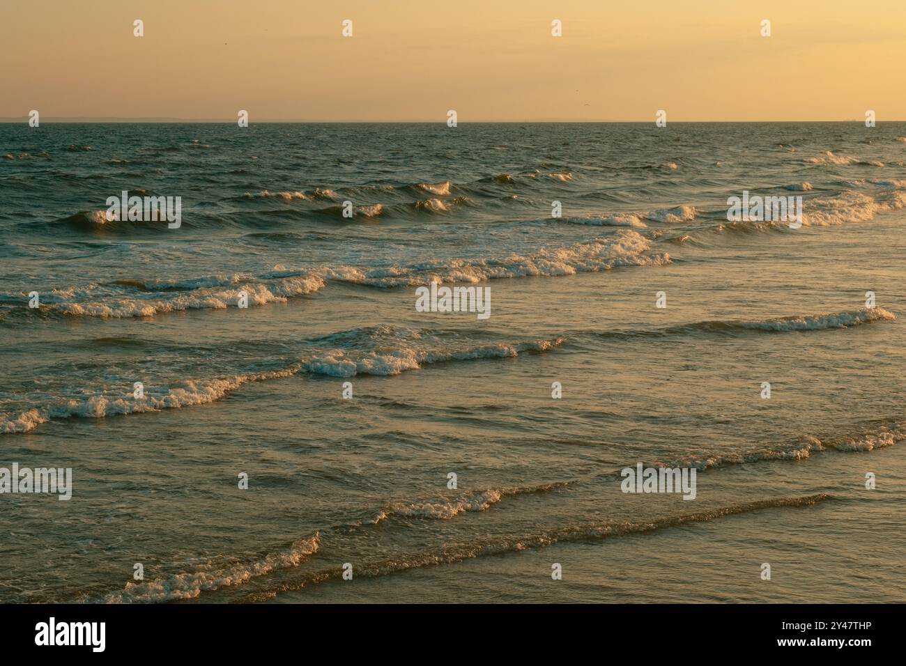 Waves at sunset, Rockaway Beach, Queens, New York Stock Photo - Alamy