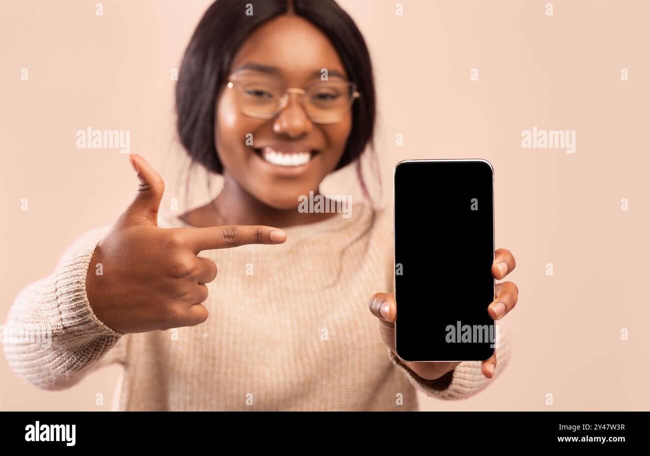 Black Lady Showing Phone Blank Screen Standing, Pink Background, Mockup ...