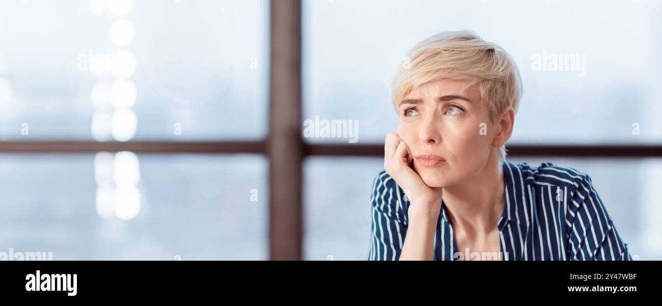 Unmotivated lady sitting workplace hi-res stock photography and images ...