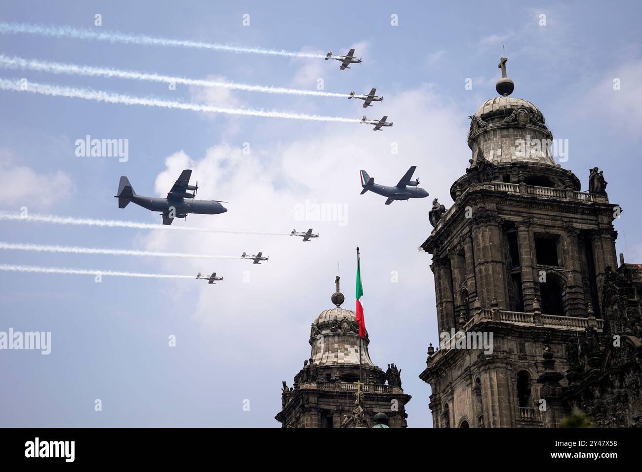 Air Force planes fly over the Zocalo, Mexico City's main square, during ...