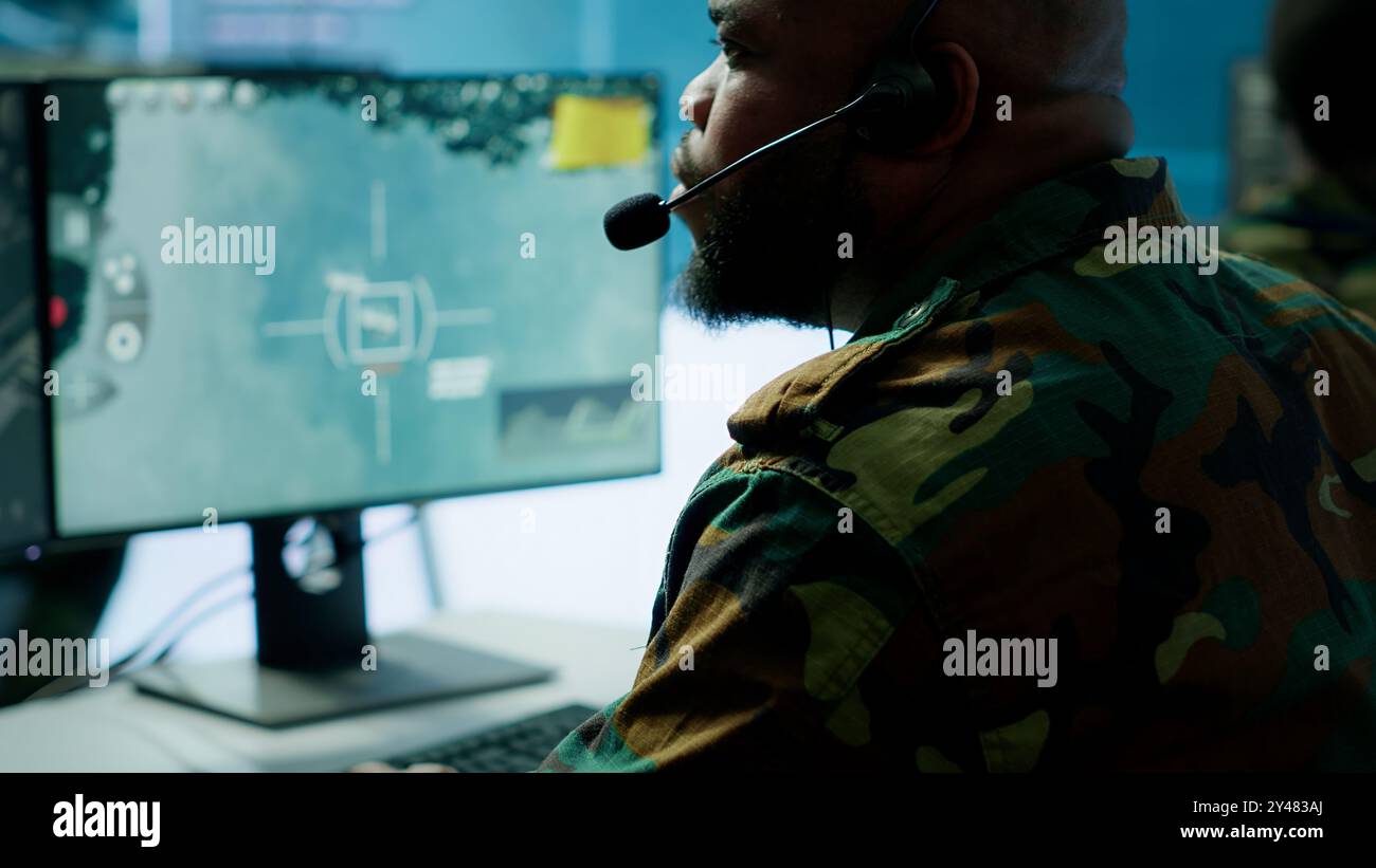 Military personnel operating in a secure office environment, processing ...