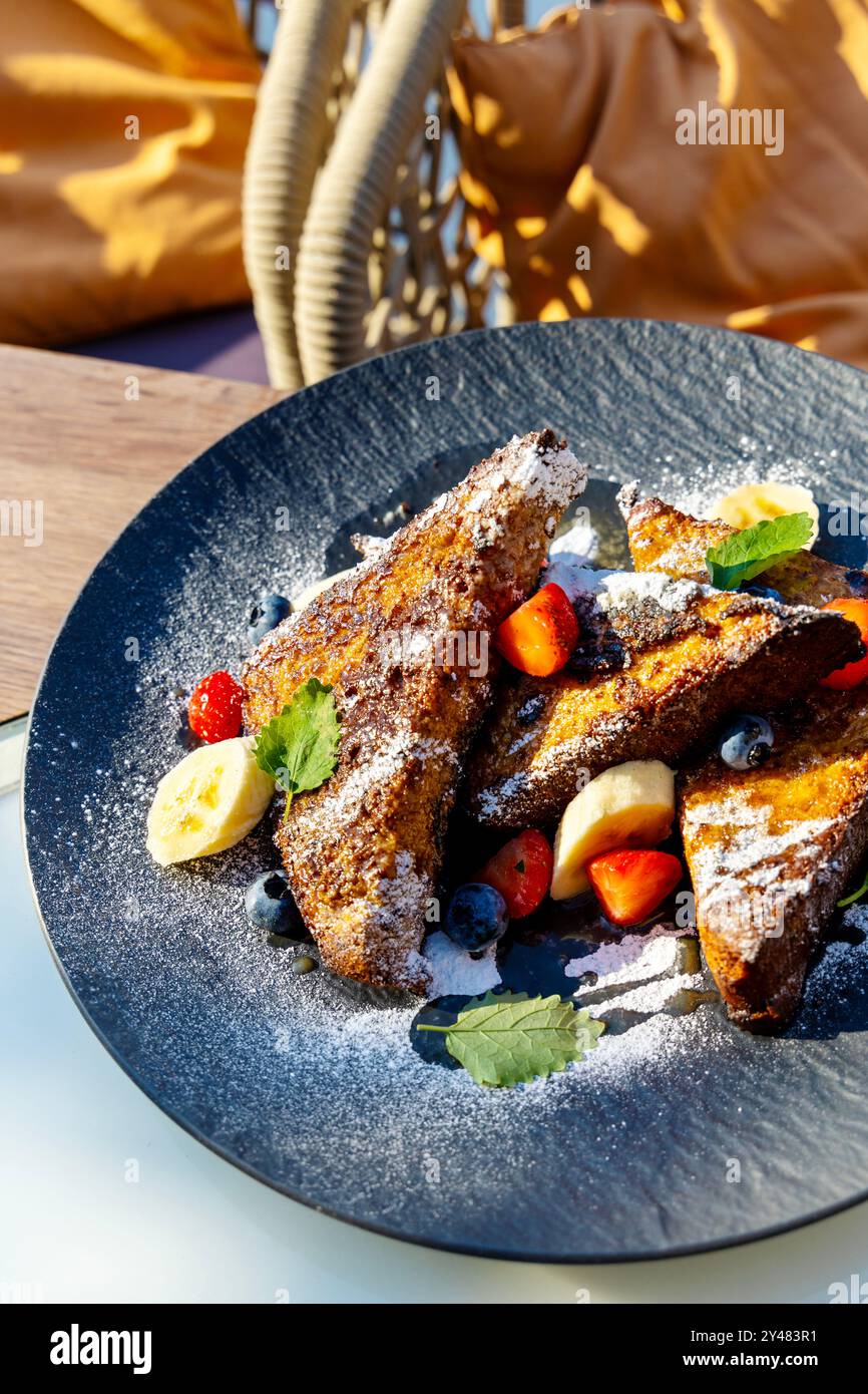 French toast with fruits and berries at Olive Tree restaurant on the ...