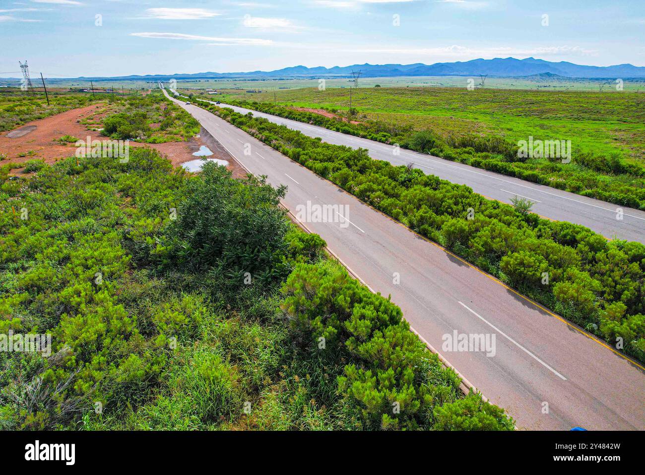 Paved road lanes with horizontal parallel lines, aerial view of dotted ...