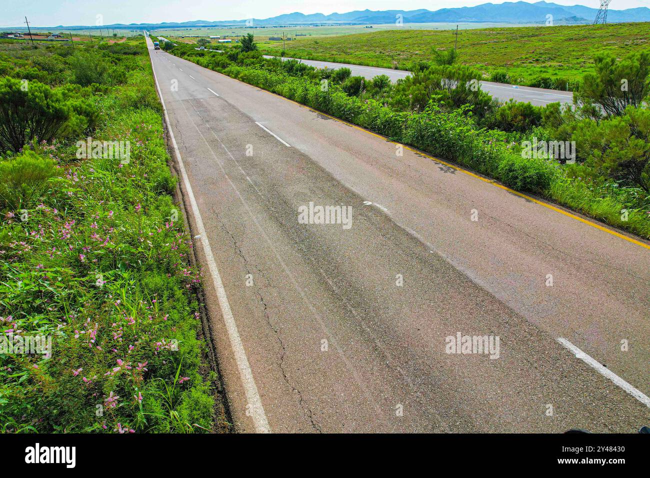 Paved road lanes with horizontal parallel lines, aerial view of dotted ...