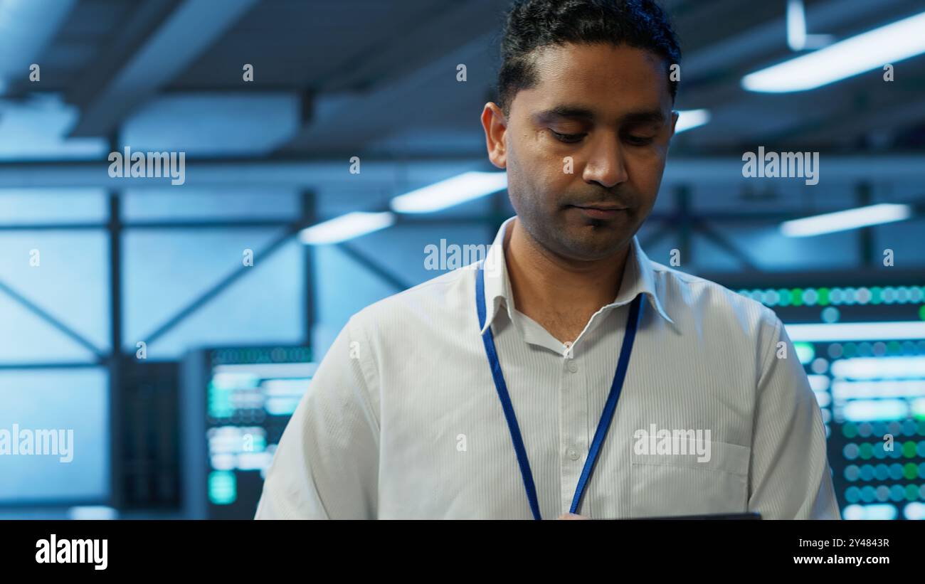 Engineer Walking In Data Center Monitoring Security Threats Implementing Cybersecurity