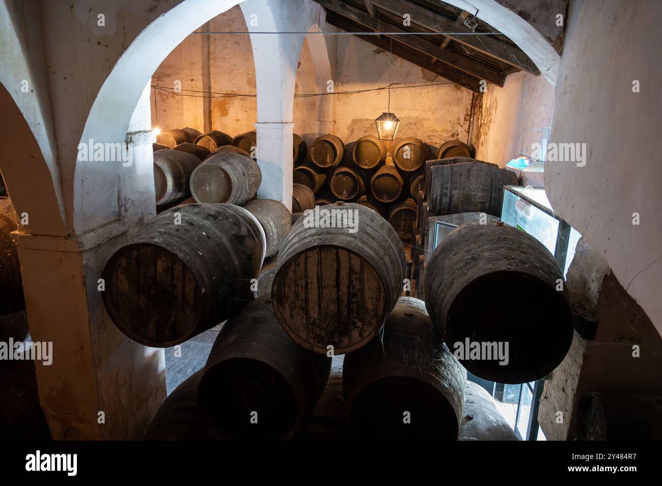 Solera systems in old Andalusian wine cellar, process for aging sherry ...