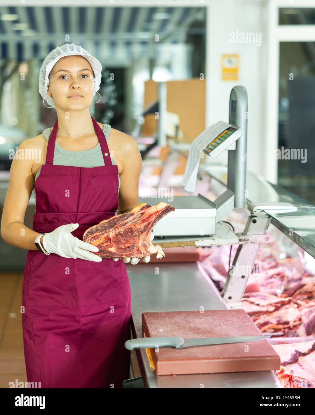 woman behind counter showcases Stock Photo - Alamy