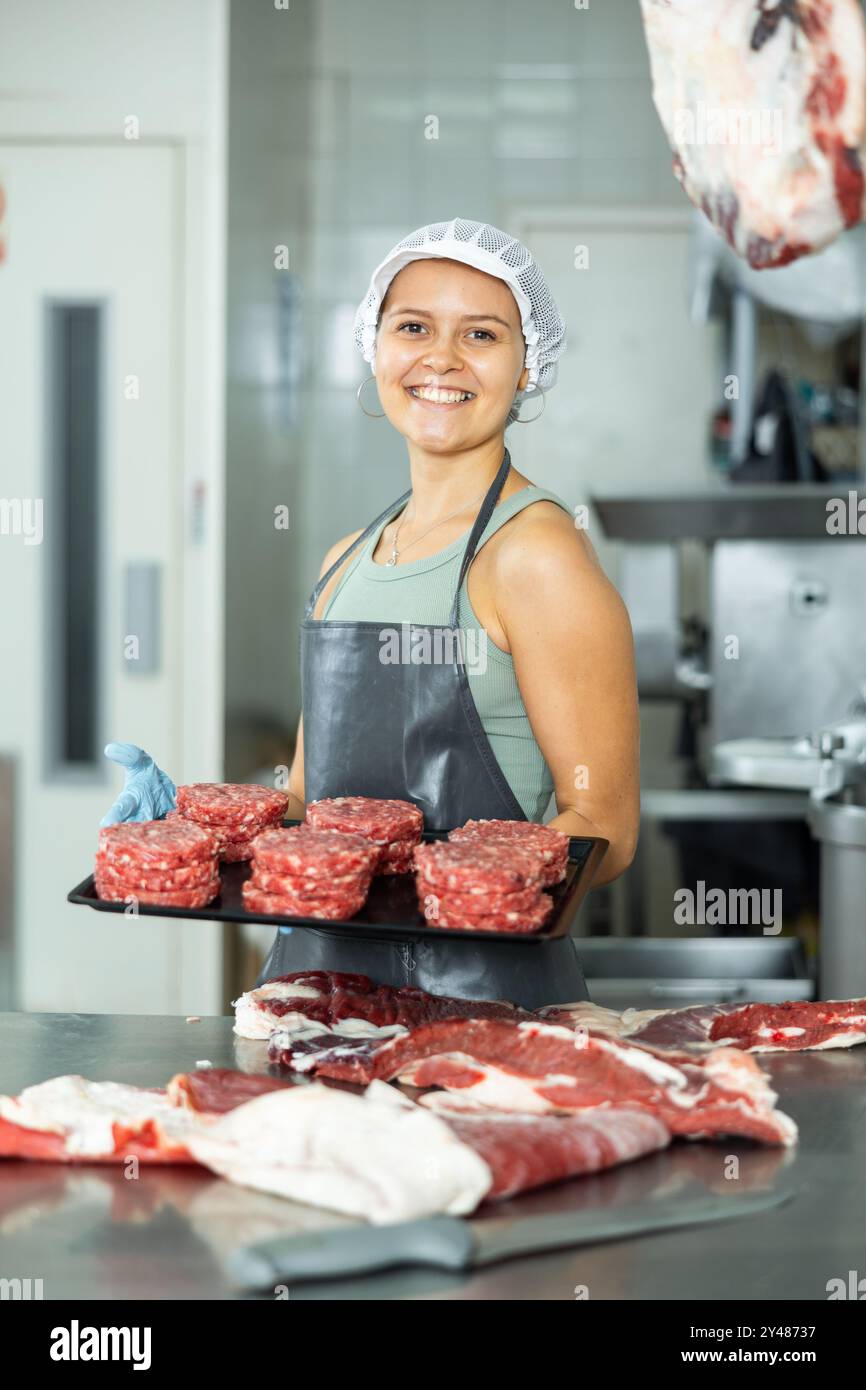 Female butcher, experienced and skilled Stock Photo - Alamy