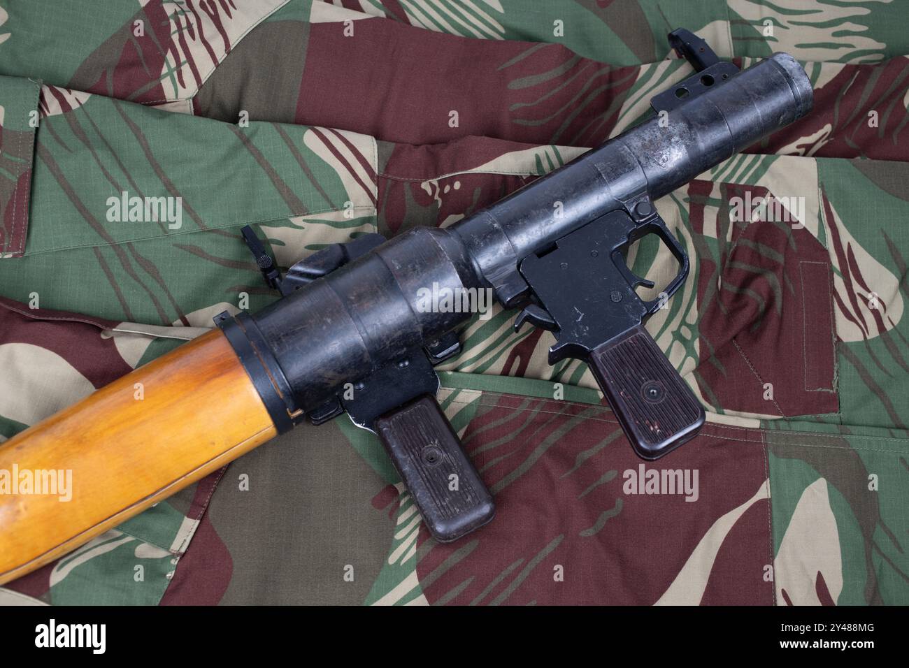 rocket propelled grenade launcher RPG 7 on camo uniform background ...