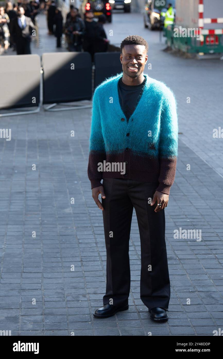 London, UK. 16 Sep, 2024. Pictured: Footballer Marc Guéhi attends Burberry's SS25 runway show ...