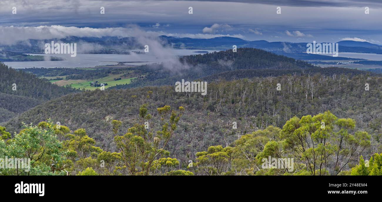 Misty cloud over low hills in the forest of Meehan range conservation ...