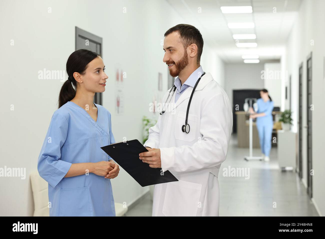Talking doctor in light hi-res stock photography and images - Alamy