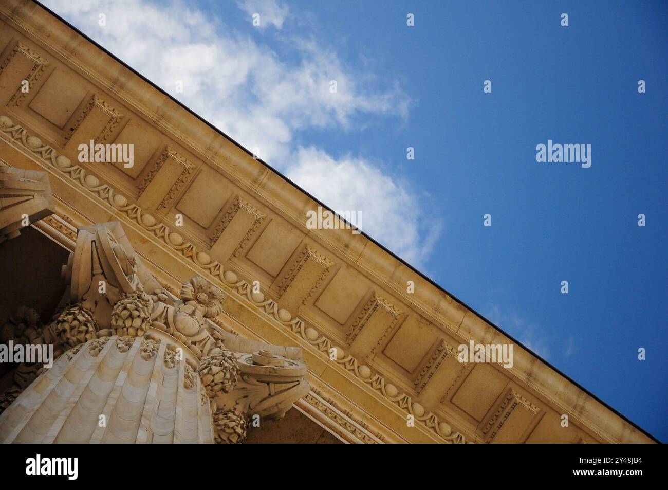 Architectural detail of an ornate column and blue sky Stock Photo - Alamy