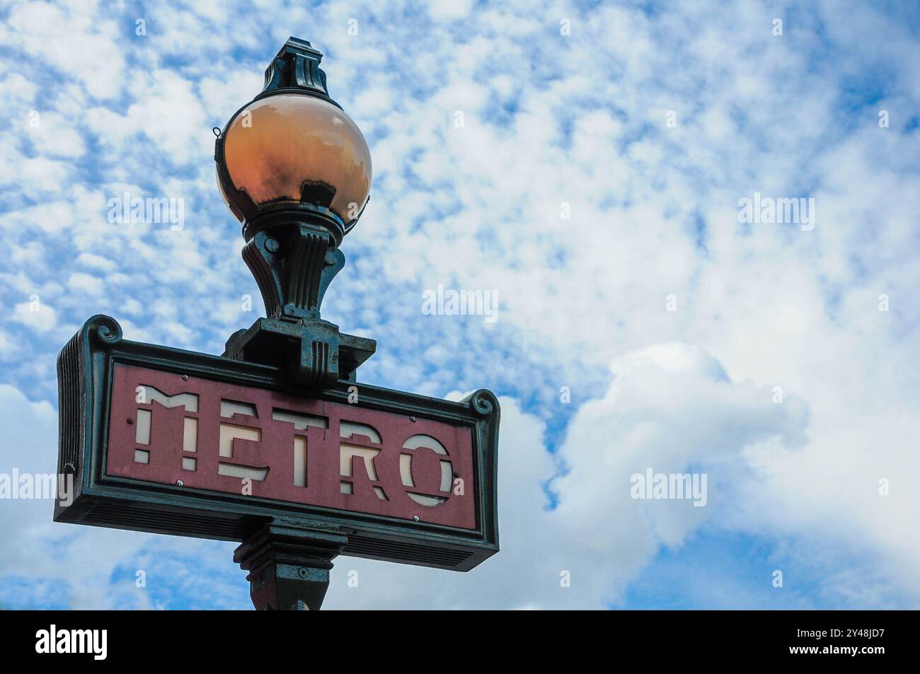 Vintage Paris Metro sign with vibrant sky, capturing the city's iconic ...