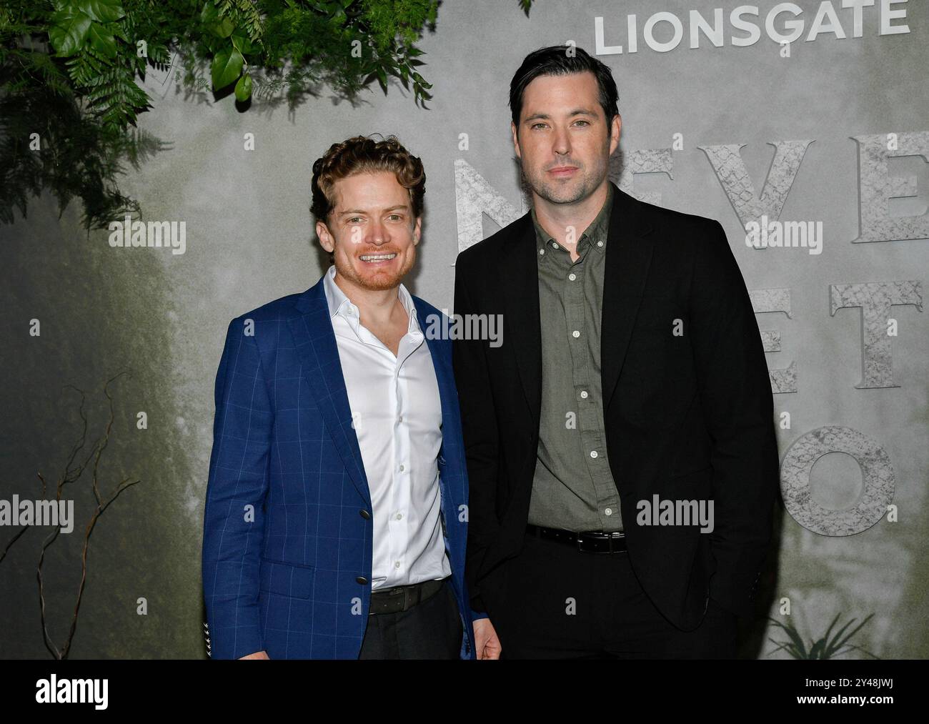 Writers Ryan Grassby, left, and KC Coughlin attend the "Never Let Go ...