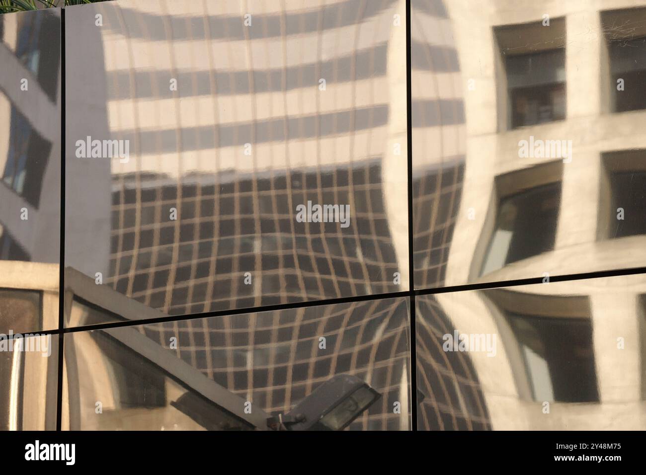 Distorted reflection of office buildings in downtown Vancouver, BC ...