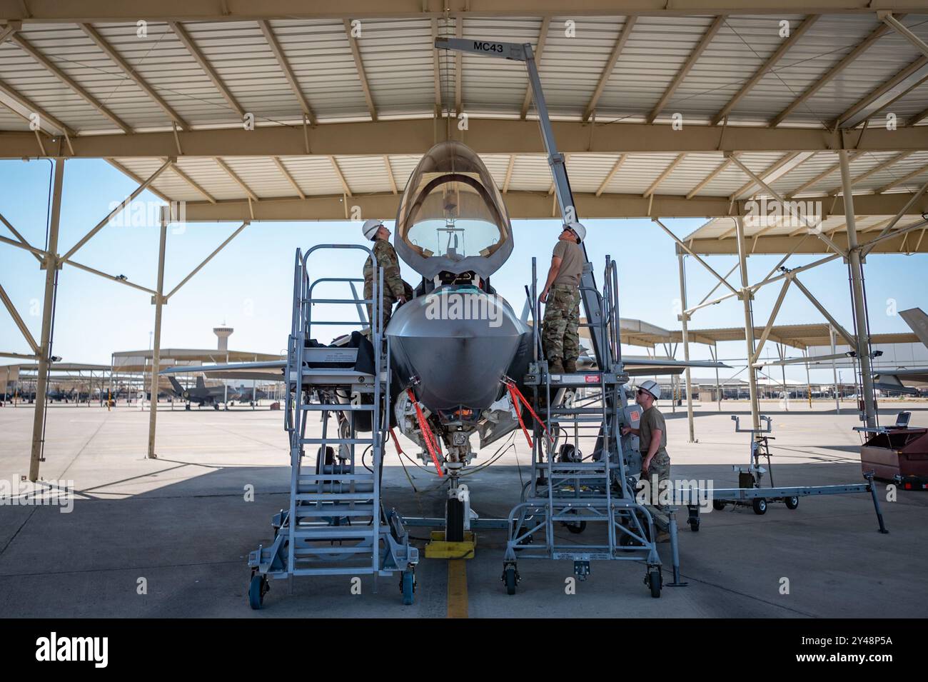 Reserve Citizen Airmen from the 944th Maintenance Group use a hoist ...
