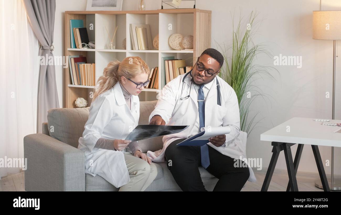 Healthcare colleagues. Doctors discussion. Clinic diagnosis. Man professional physician and ...