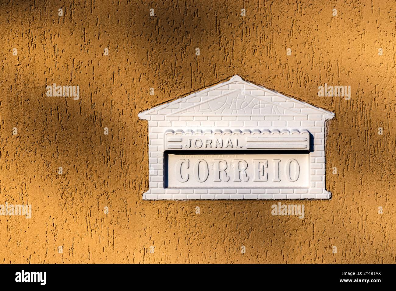 Metal mail box on the rough wall in Brazil Stock Photo - Alamy