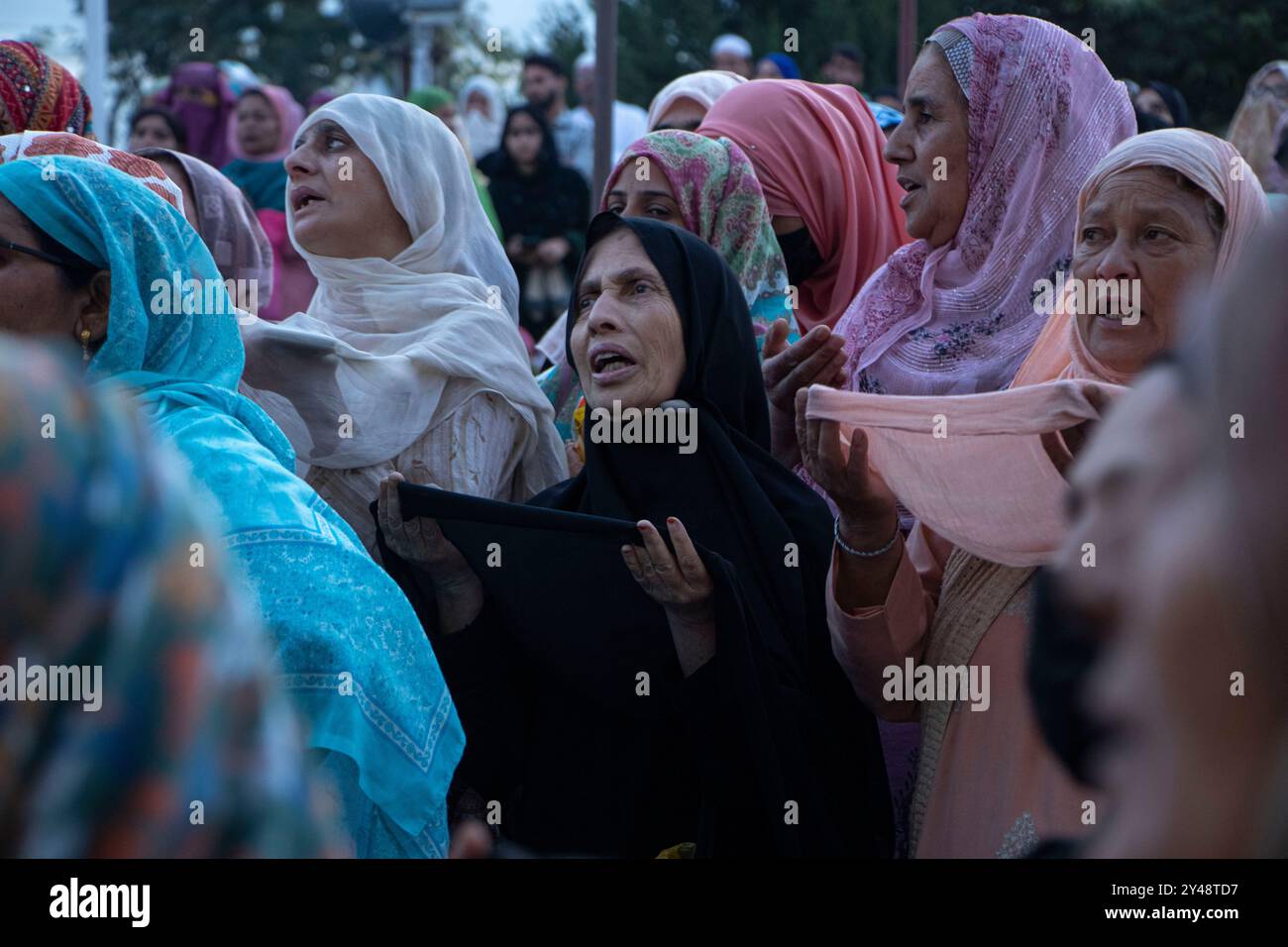 Srinagar, Jammu And Kashmir, India. 17th Sep, 2024. Muslim devotees pray outside the shrine ...