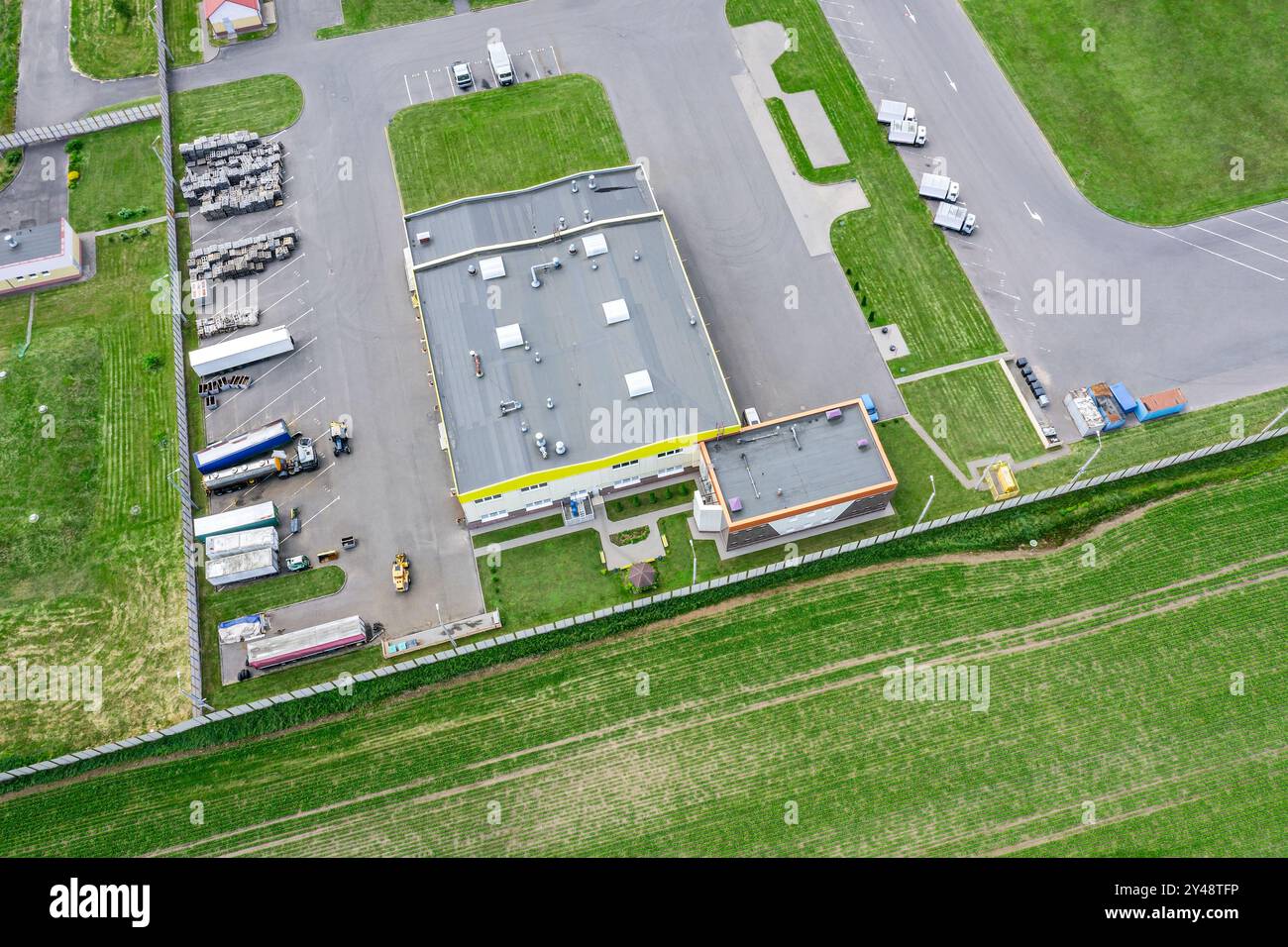aerial view of goods warehouse. industrial storage buildings in suburb ...