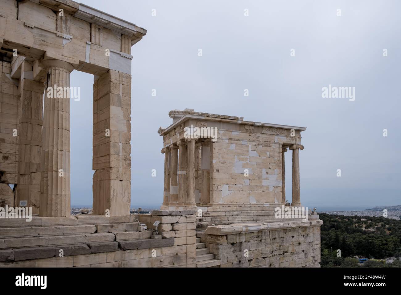 View of the Temple of Athena Nike (right), a temple on the Acropolis of Athens, dedicated to the ...