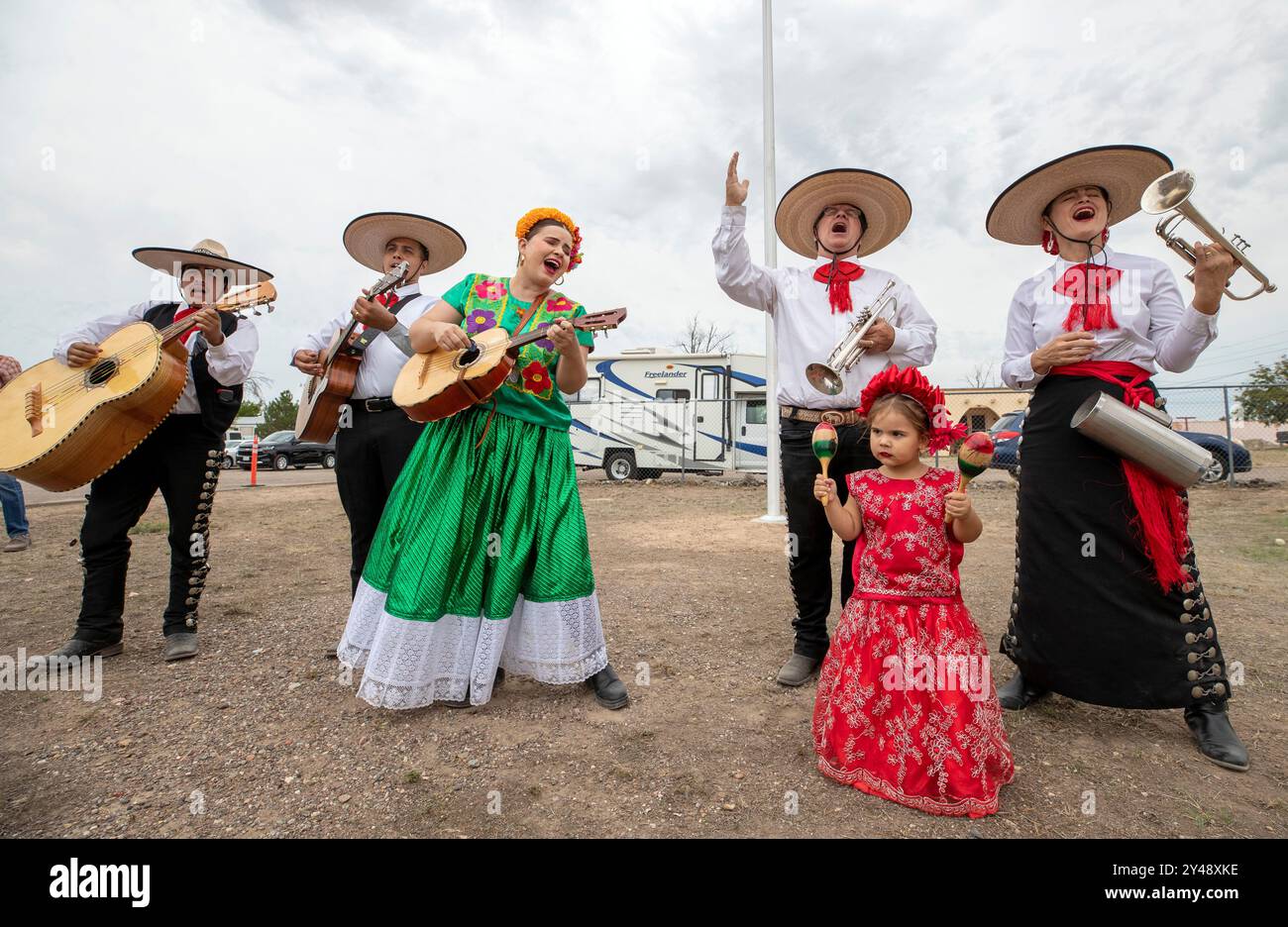 A Mariachi band performs during the ribbon-cutting ceremony to ...